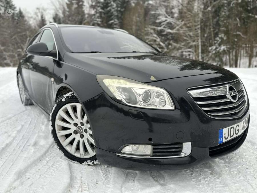 Black Opel Insignia 2011 in Vilnius, with an engine capacity of 1.96 L and mileage of 322 thousand km for 3300 €, photo 11 on AUTOMOTO.COM.LV
