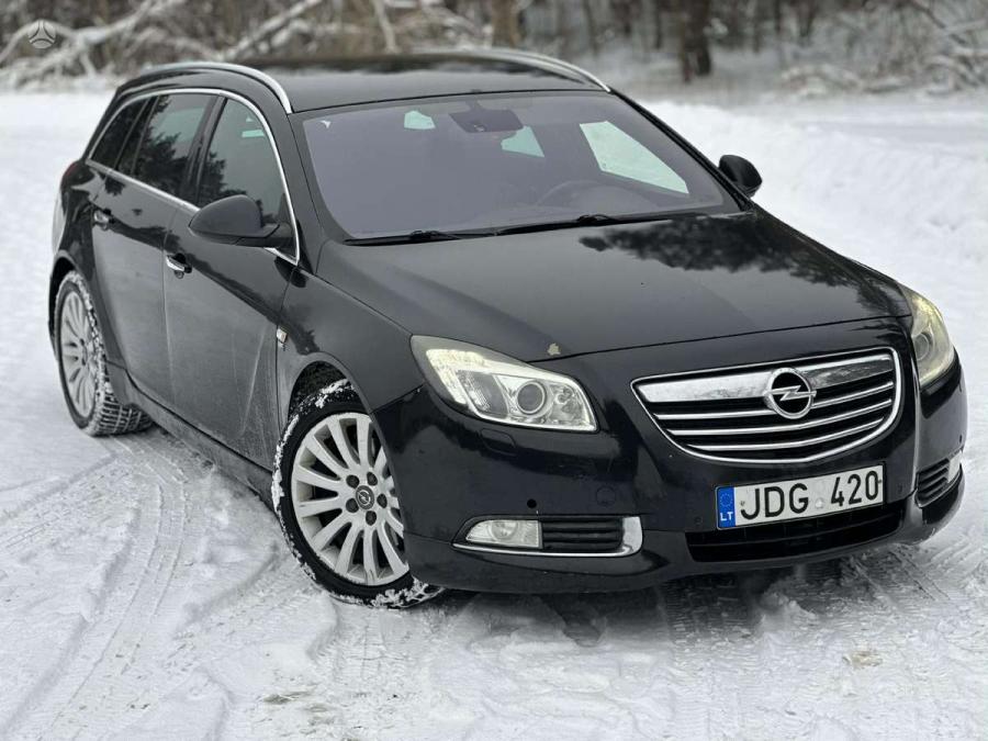 Black Opel Insignia 2011 in Vilnius, with an engine capacity of 1.96 L and mileage of 322 thousand km for 3300 €, photo 12 on AUTOMOTO.COM.LV