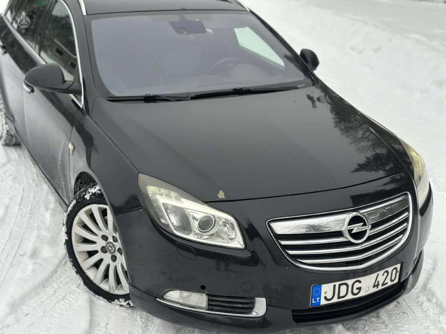 Black Opel Insignia 2011 in Vilnius, with an engine capacity of 1.96 L and mileage of 322 thousand km for 3300 €, photo 14 on AUTOMOTO.COM.LV