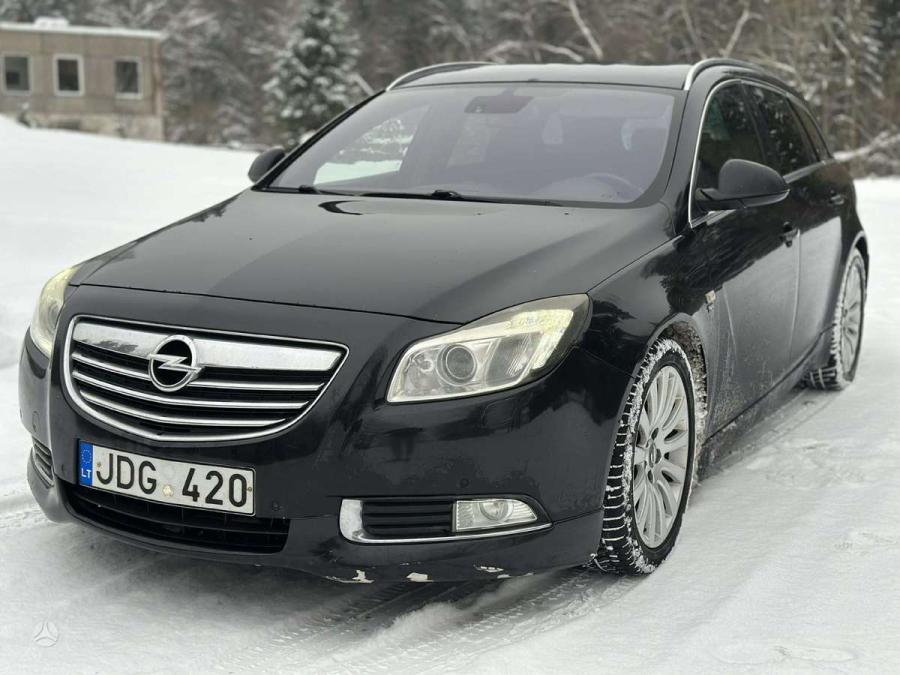 Black Opel Insignia 2011 in Vilnius, with an engine capacity of 1.96 L and mileage of 322 thousand km for 3300 €, photo 20 on AUTOMOTO.COM.LV