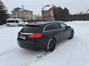 Black Opel Insignia 2011 in Kaunas, with an engine capacity of 1.96 L and mileage of 262 thousand km for 2999 €, photo 3 on AUTOMOTO.COM.LV