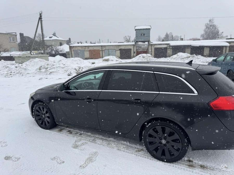 Black Opel Insignia 2011 in Kaunas, with an engine capacity of 1.96 L and mileage of 262 thousand km for 2999 €, photo 4 on AUTOMOTO.COM.LV