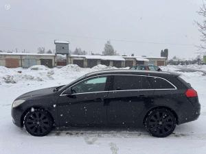 Black Opel Insignia 2011 in Kaunas, with an engine capacity of 1.96 L and mileage of 262 thousand km for 2999 €, photo 14 on AUTOMOTO.COM.LV