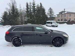 Black Opel Insignia 2011 in Kaunas, with an engine capacity of 1.96 L and mileage of 262 thousand km for 2999 €, photo 15 on AUTOMOTO.COM.LV