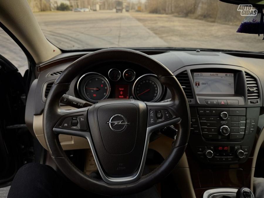 Black Opel Insignia 2011 in Siauliai, with an engine capacity of 2.00 L and mileage of 250 thousand km for 2650 €, photo 29 on AUTOMOTO.COM.LV