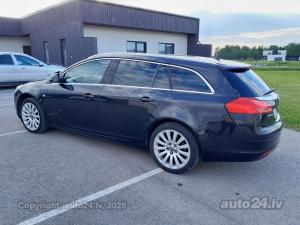 Black Opel Insignia 2011 in Tallinn, with an engine capacity of 2.00 L and mileage of 327 thousand km for 2590 €, photo 5 on AUTOMOTO.COM.LV