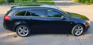 Melns Opel Insignia 2011 Rīga, ar dzinēja tilpumu 2.00 L un nobraukumu 303 tūkst. km par 1000 €, foto  vietnē AUTOMOTO.COM.LV