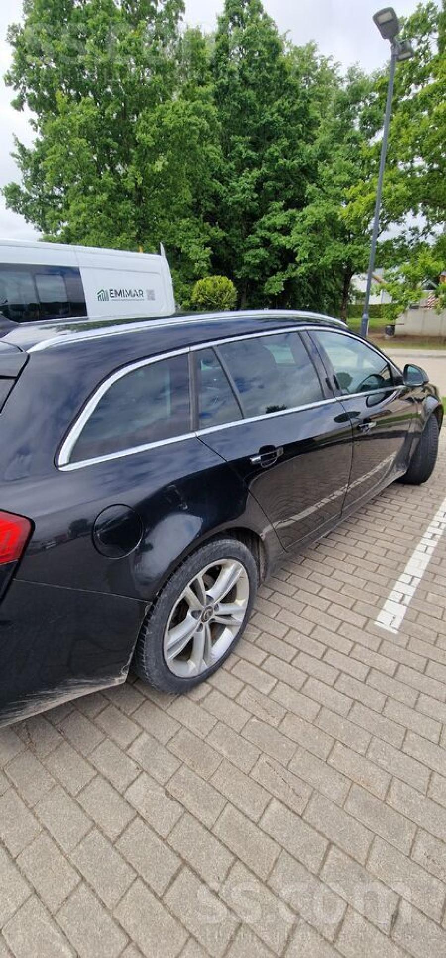 Black Opel Insignia 2011 in Riga, with an engine capacity of 2.00 L and mileage of 288 thousand km for 2455 €, photo 6 on AUTOMOTO.COM.LV