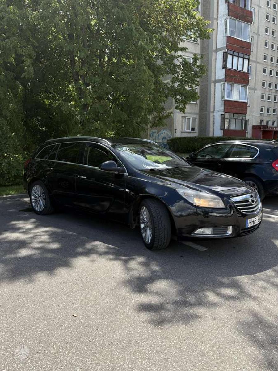 Black Opel Insignia 2011 in Kaunas, with an engine capacity of 1.96 L and mileage of 400 thousand km for 2499 €, photo 4 on AUTOMOTO.COM.LV