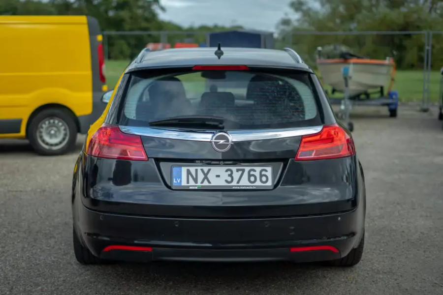 Melns Opel Insignia 2011 Liepāja, ar dzinēja tilpumu 2.00 L un nobraukumu 294 tūkst. km par 3850 €, foto 4 vietnē AUTOMOTO.COM.LV
