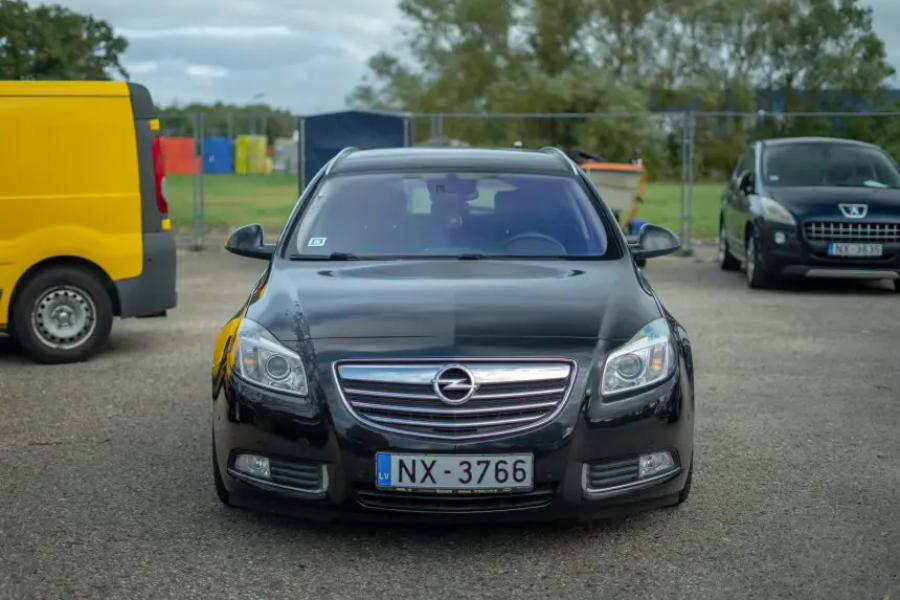 Melns Opel Insignia 2011 Liepāja, ar dzinēja tilpumu 2.00 L un nobraukumu 294 tūkst. km par 3850 €, foto 7 vietnē AUTOMOTO.COM.LV