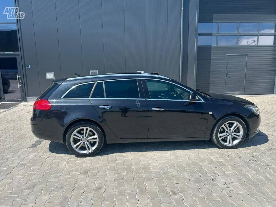 Black Opel Insignia 2011 in Klaipeda, with an engine capacity of 2.00 L and mileage of 283 thousand km for 3900 €, photo 7 on AUTOMOTO.COM.LV