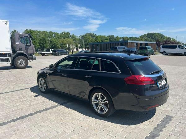 Black Opel Insignia 2011 in Klaipeda, with an engine capacity of 1.96 L and mileage of 283 thousand km for 3900 €, photo 8 on AUTOMOTO.COM.LV