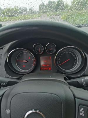 Black Opel Insignia 2011 in Vilnius, with an engine capacity of 2.00 L and mileage of 304 thousand km for 2250 €, photo 14 on AUTOMOTO.COM.LV