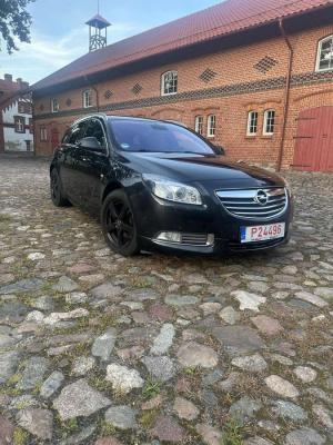 Black Opel Insignia 2011 in Silute, with an engine capacity of 1.96 L and mileage of 259 thousand km for 3300 €, photo  on AUTOMOTO.COM.LV