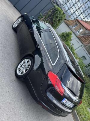 Black Opel Insignia 2011 in Klaipeda, with an engine capacity of 1.96 L and mileage of 370 thousand km for 2250 €, photo 5 on AUTOMOTO.COM.LV