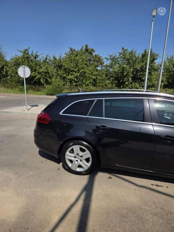 Black Opel Insignia 2011 in Panevezys, with an engine capacity of 1.96 L and mileage of 303 thousand km for 3200 €, photo 10 on AUTOMOTO.COM.LV