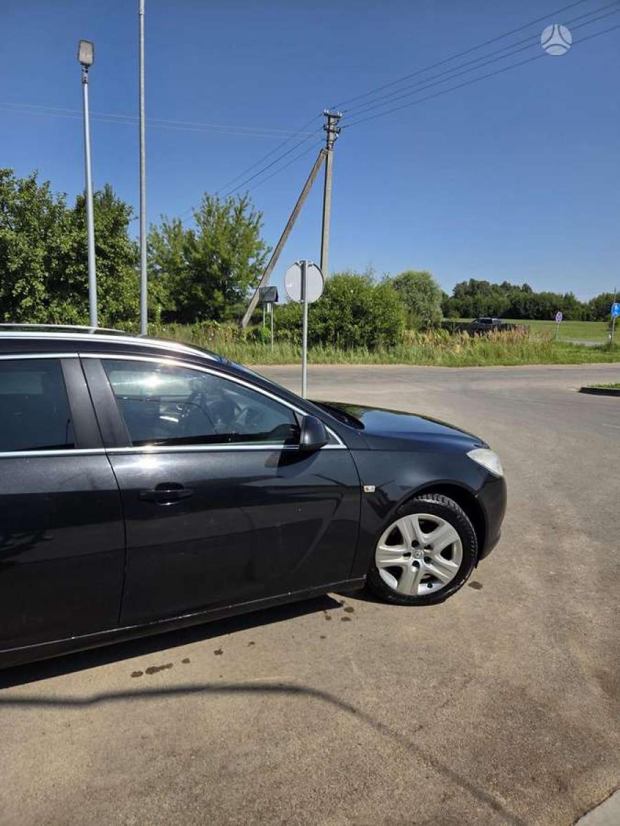 Melns Opel Insignia 2011 Panevēža, ar dzinēja tilpumu 1.96 L un nobraukumu 303 tūkst. km par 3200 €, foto 11 vietnē AUTOMOTO.COM.LV