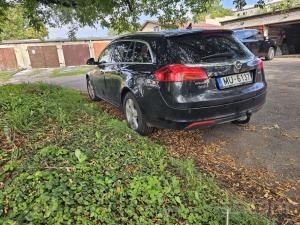 Black Opel Insignia 2011 in Riga, with an engine capacity of 2.00 L and mileage of 332 thousand km for 1900 €, photo 6 on AUTOMOTO.COM.LV
