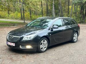 Black Opel Insignia 2011 in Riga, with an engine capacity of 2.00 L and mileage of 0 thousand km for 3499 €, photo  on AUTOMOTO.COM.LV