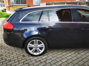Black Opel Insignia 2011 in Klaipeda, with an engine capacity of 2.00 L and mileage of 209 thousand km for 3390 €, photo 12 on AUTOMOTO.COM.LV