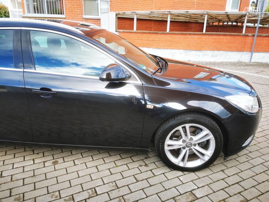 Black Opel Insignia 2011 in Klaipeda, with an engine capacity of 2.00 L and mileage of 209 thousand km for 3390 €, photo 13 on AUTOMOTO.COM.LV
