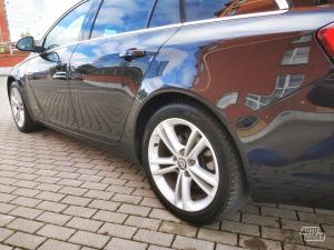 Black Opel Insignia 2011 in Klaipeda, with an engine capacity of 2.00 L and mileage of 209 thousand km for 3390 €, photo 14 on AUTOMOTO.COM.LV