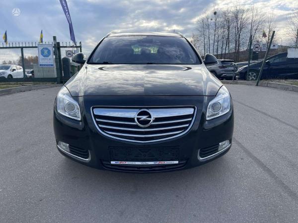 Black Opel Insignia 2012 in Kaunas, with an engine capacity of 2.00 L and mileage of 256 thousand km for 3950 €, photo 4 on AUTOMOTO.COM.LV