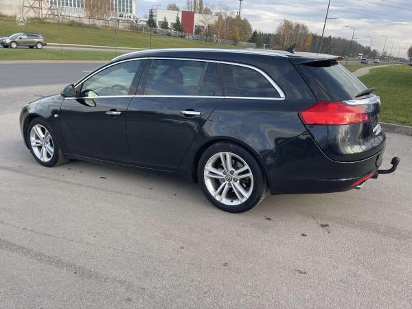 Black Opel Insignia 2012 in Kaunas, with an engine capacity of 2.00 L and mileage of 256 thousand km for 3950 €, photo 9 on AUTOMOTO.COM.LV