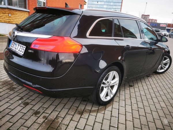 Black Opel Insignia 2012 in Klaipeda, with an engine capacity of 1.96 L and mileage of 214 thousand km for 4400 €, photo 6 on AUTOMOTO.COM.LV