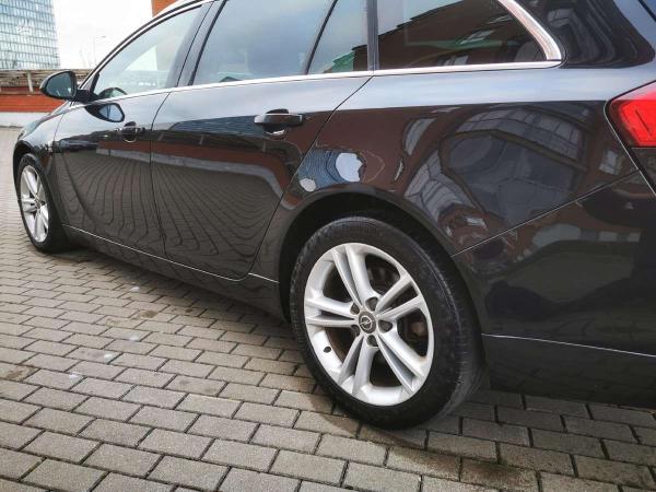 Black Opel Insignia 2012 in Klaipeda, with an engine capacity of 1.96 L and mileage of 214 thousand km for 4400 €, photo 7 on AUTOMOTO.COM.LV