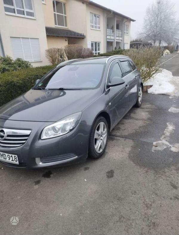 Black Opel Insignia 2012 in Prienai, with an engine capacity of 1.96 L and mileage of 244 thousand km for 1799 €, photo 5 on AUTOMOTO.COM.LV