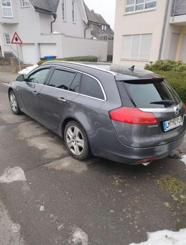 Black Opel Insignia 2012 in Prienai, with an engine capacity of 1.96 L and mileage of 244 thousand km for 1799 €, photo 7 on AUTOMOTO.COM.LV