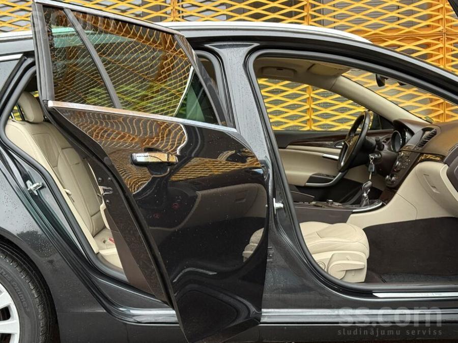 Black Opel Insignia 2012 in Ogre, with an engine capacity of 2.00 L and mileage of 197 thousand km for 5997 €, photo 14 on AUTOMOTO.COM.LV