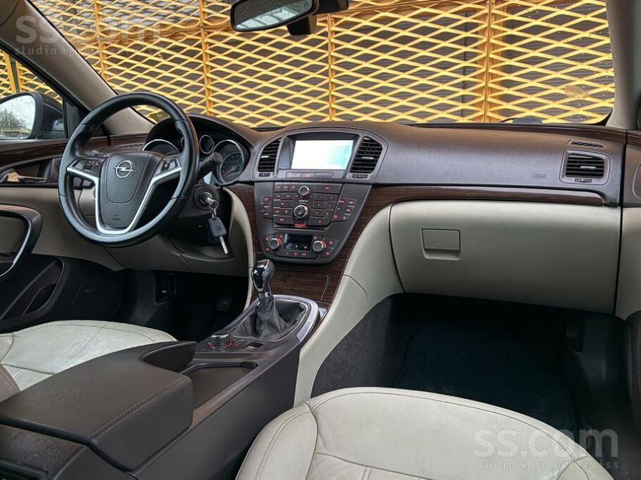 Black Opel Insignia 2012 in Ogre, with an engine capacity of 2.00 L and mileage of 197 thousand km for 5997 €, photo 18 on AUTOMOTO.COM.LV