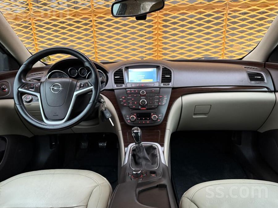 Black Opel Insignia 2012 in Ogre, with an engine capacity of 2.00 L and mileage of 197 thousand km for 5997 €, photo 19 on AUTOMOTO.COM.LV
