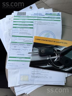 Black Opel Insignia 2012 in Ogre, with an engine capacity of 2.00 L and mileage of 197 thousand km for 5997 €, photo 28 on AUTOMOTO.COM.LV