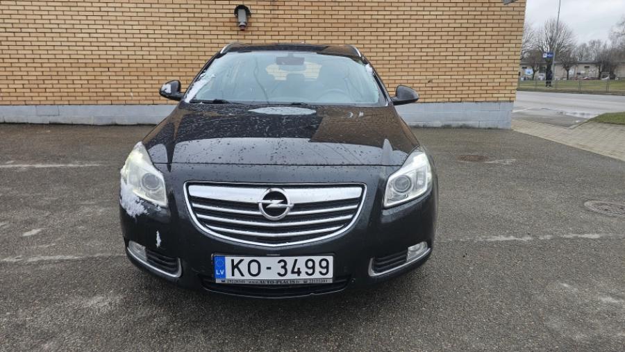 Black Opel Insignia 2012 in Riga, with an engine capacity of 2.00 L and mileage of 281 thousand km for 3950 €, photo 16 on AUTOMOTO.COM.LV