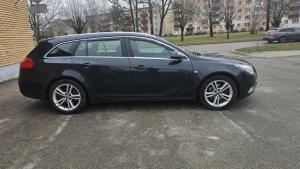 Black Opel Insignia 2012 in Riga, with an engine capacity of 2.00 L and mileage of 281 thousand km for 3950 €, photo 18 on AUTOMOTO.COM.LV