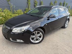 Black Opel Insignia 2012 in Vilnius, with an engine capacity of 1.96 L and mileage of 200 thousand km for 4444 €, photo 4 on AUTOMOTO.COM.LV