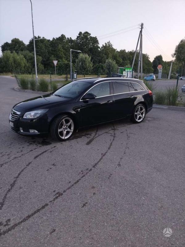 Melns Opel Insignia 2012 Kauņa, ar dzinēja tilpumu 1.96 L un nobraukumu 301 tūkst. km par 2899 €, foto 3 vietnē AUTOMOTO.COM.LV