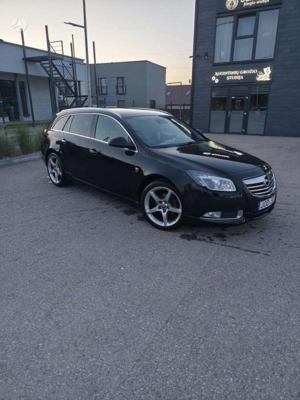 Melns Opel Insignia 2012 Kauņa, ar dzinēja tilpumu 1.96 L un nobraukumu 301 tūkst. km par 2899 €, foto 5 vietnē AUTOMOTO.COM.LV