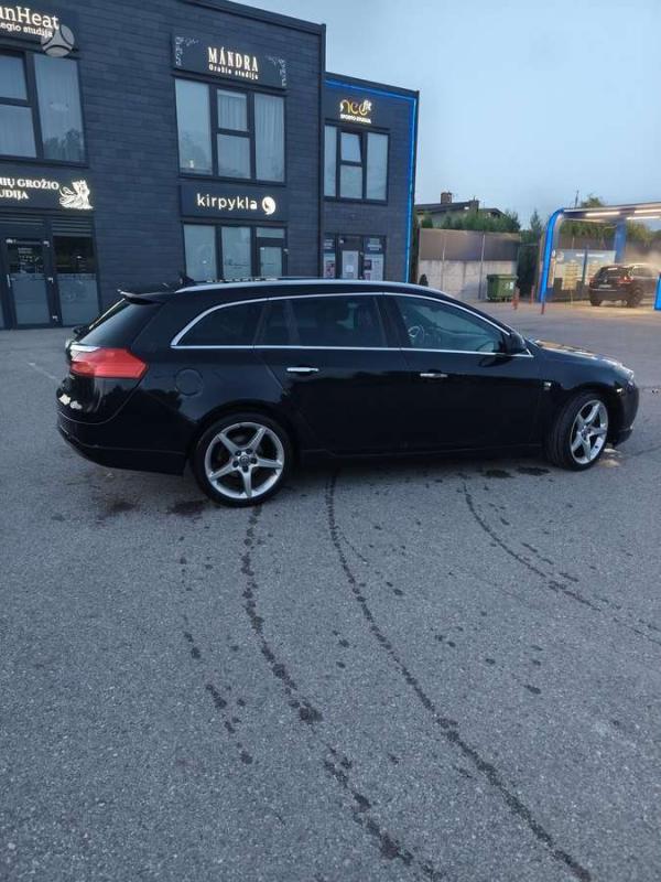 Melns Opel Insignia 2012 Kauņa, ar dzinēja tilpumu 1.96 L un nobraukumu 301 tūkst. km par 2899 €, foto 6 vietnē AUTOMOTO.COM.LV