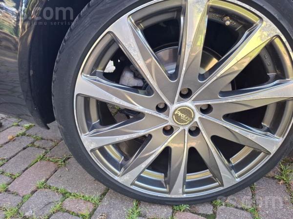 Black Opel Insignia 2012 in Riga, with an engine capacity of 2.00 L and mileage of 261 thousand km for 7000 €, photo 7 on AUTOMOTO.COM.LV