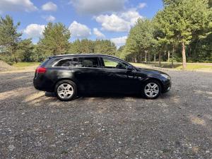 Black Opel Insignia 2012 in Jonava, with an engine capacity of 1.36 L and mileage of 217 thousand km for 2650 €, photo 5 on AUTOMOTO.COM.LV