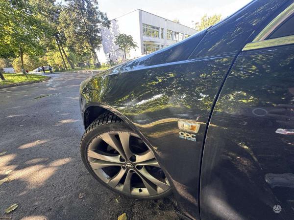 Black Opel Insignia 2012 in Vilnius, with an engine capacity of 1.96 L and mileage of 312 thousand km for 2500 €, photo 3 on AUTOMOTO.COM.LV