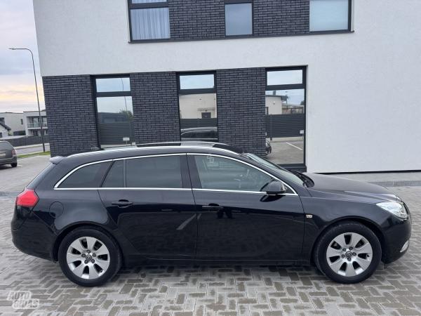 Black Opel Insignia 2012 in Kaunas, with an engine capacity of 2.00 L and mileage of 336 thousand km for 2650 €, photo 6 on AUTOMOTO.COM.LV