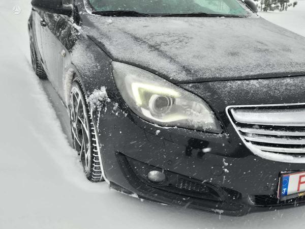 Black Opel Insignia 2013 in Siauliai, with an engine capacity of 2.00 L and mileage of 182 thousand km for 5400 €, photo 3 on AUTOMOTO.COM.LV