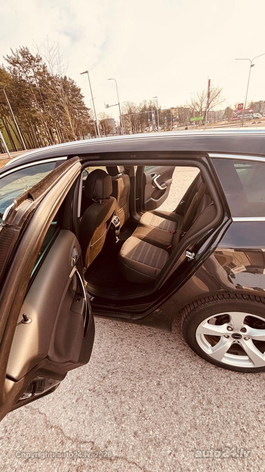 Black Opel Insignia 2013 in Tallinn, with an engine capacity of 2.00 L and mileage of 0 thousand km for 4999 €, photo 10 on AUTOMOTO.COM.LV