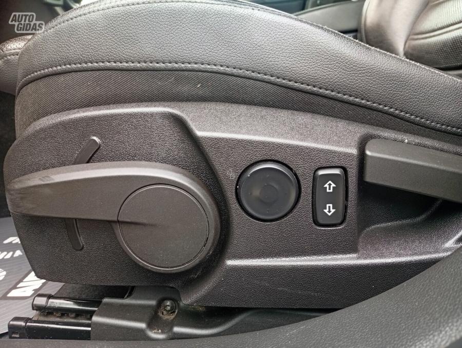 Black Opel Insignia 2013 in Vilnius, with an engine capacity of 2.00 L and mileage of 354 thousand km for 3900 €, photo 26 on AUTOMOTO.COM.LV